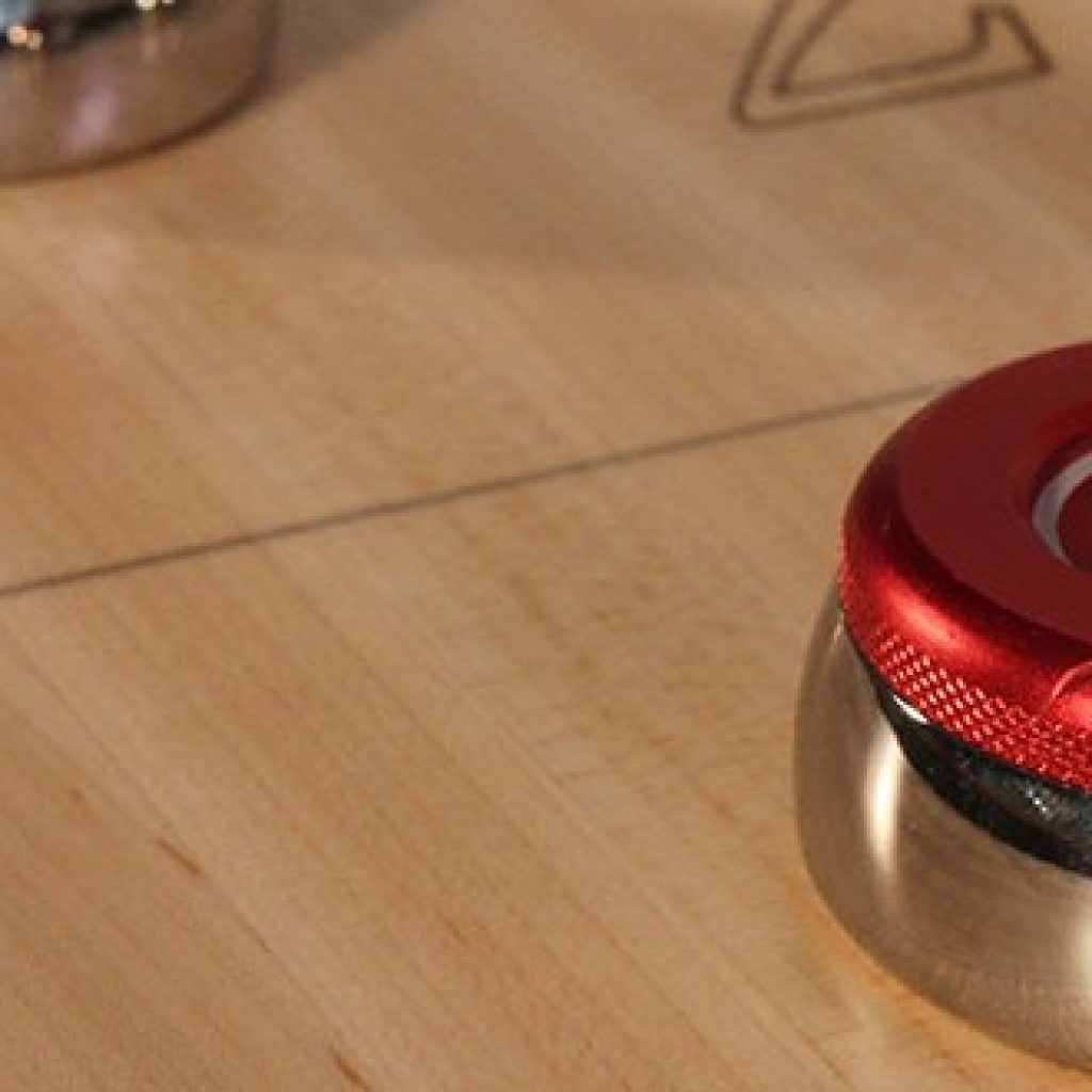Choosing the Right Pucks for Your Shuffleboard Table – McClure Tables