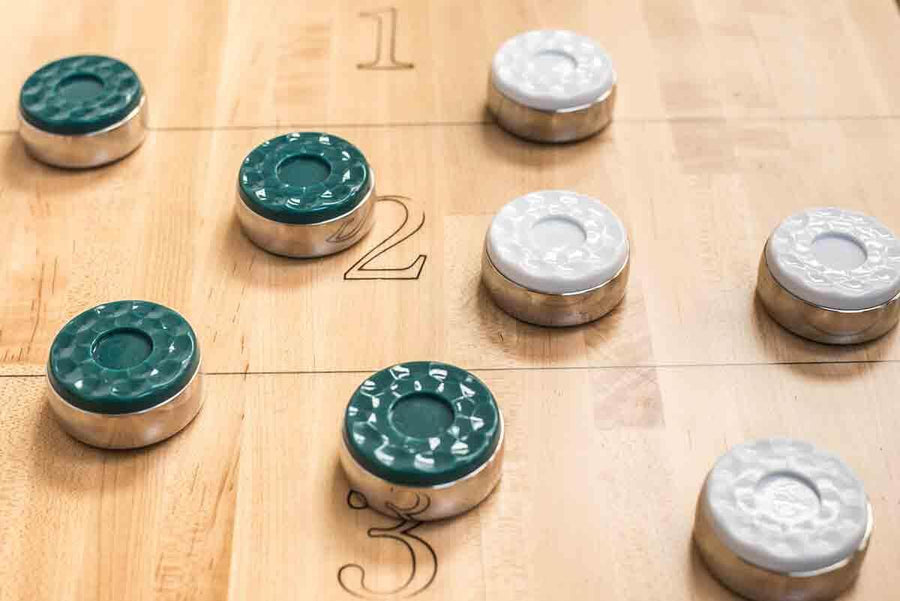 Shuffleboard Pucks & Weights | McClure Tables